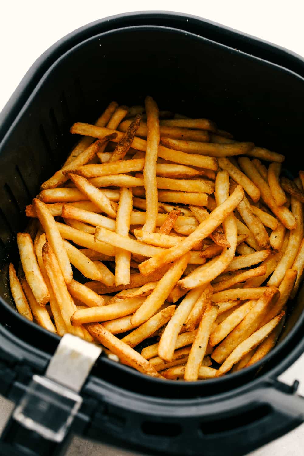 Are frozen fries better in the oven or air fryer?