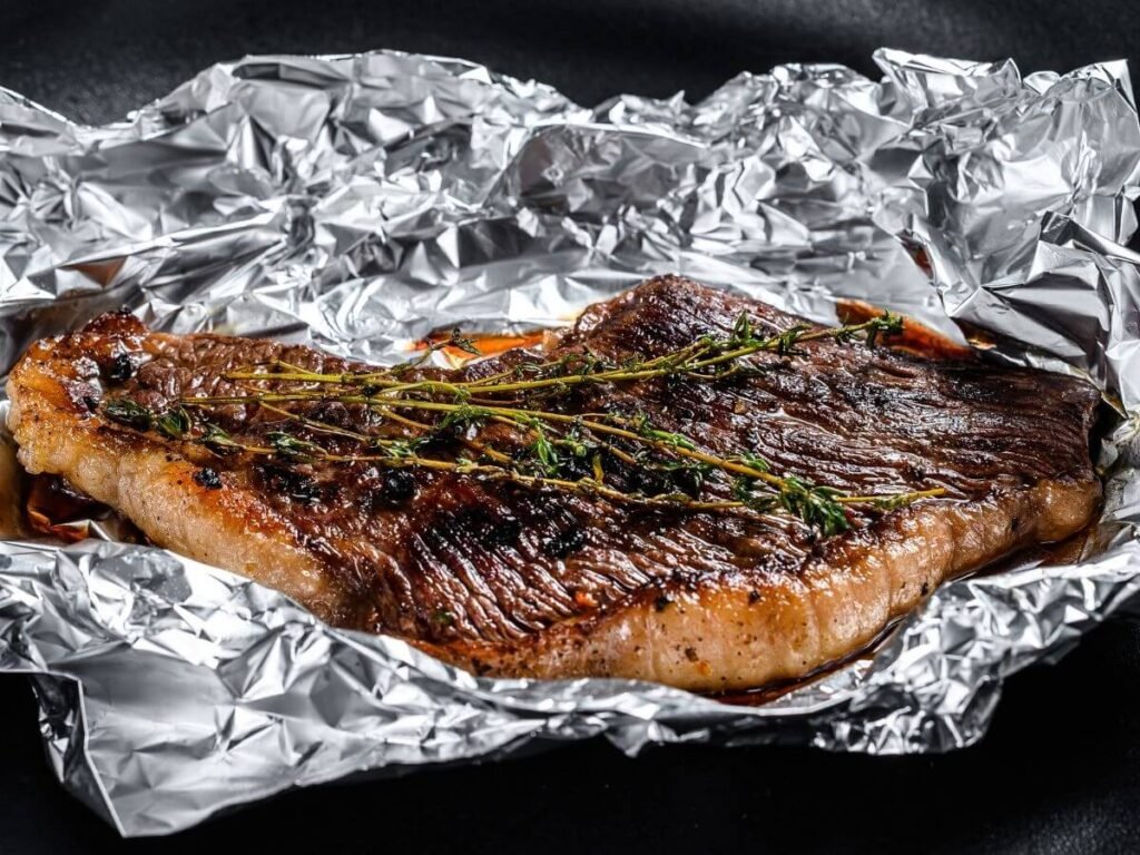 Can you cook steak on aluminum foil in the oven?