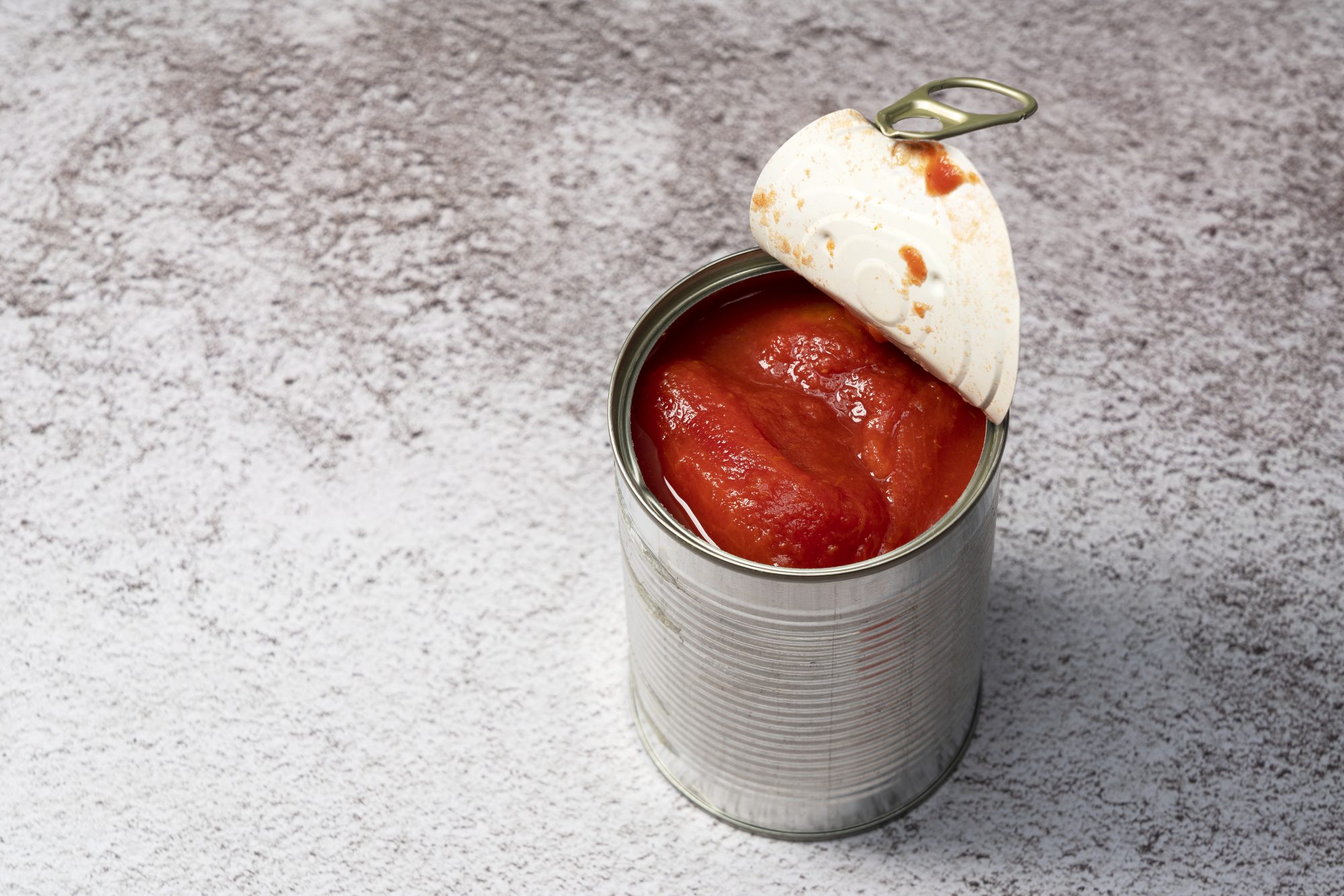 Can you save an opened can of crushed tomatoes?