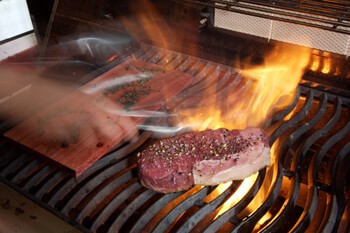 Do you close grill when cooking steak?