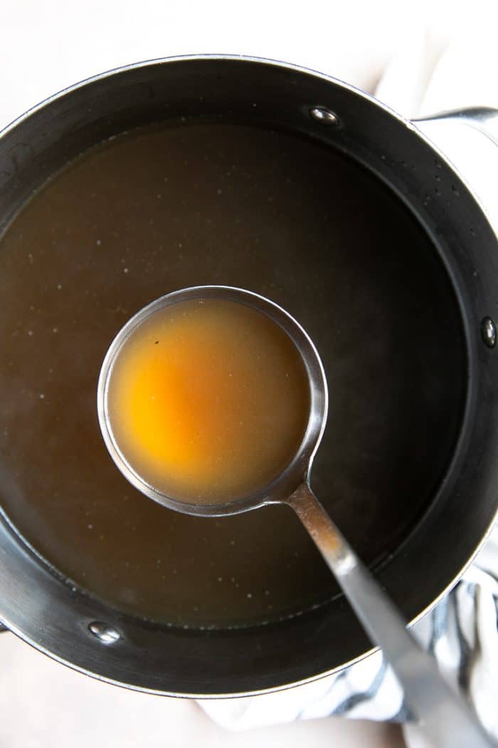 Do you cover the pot when making bone broth?