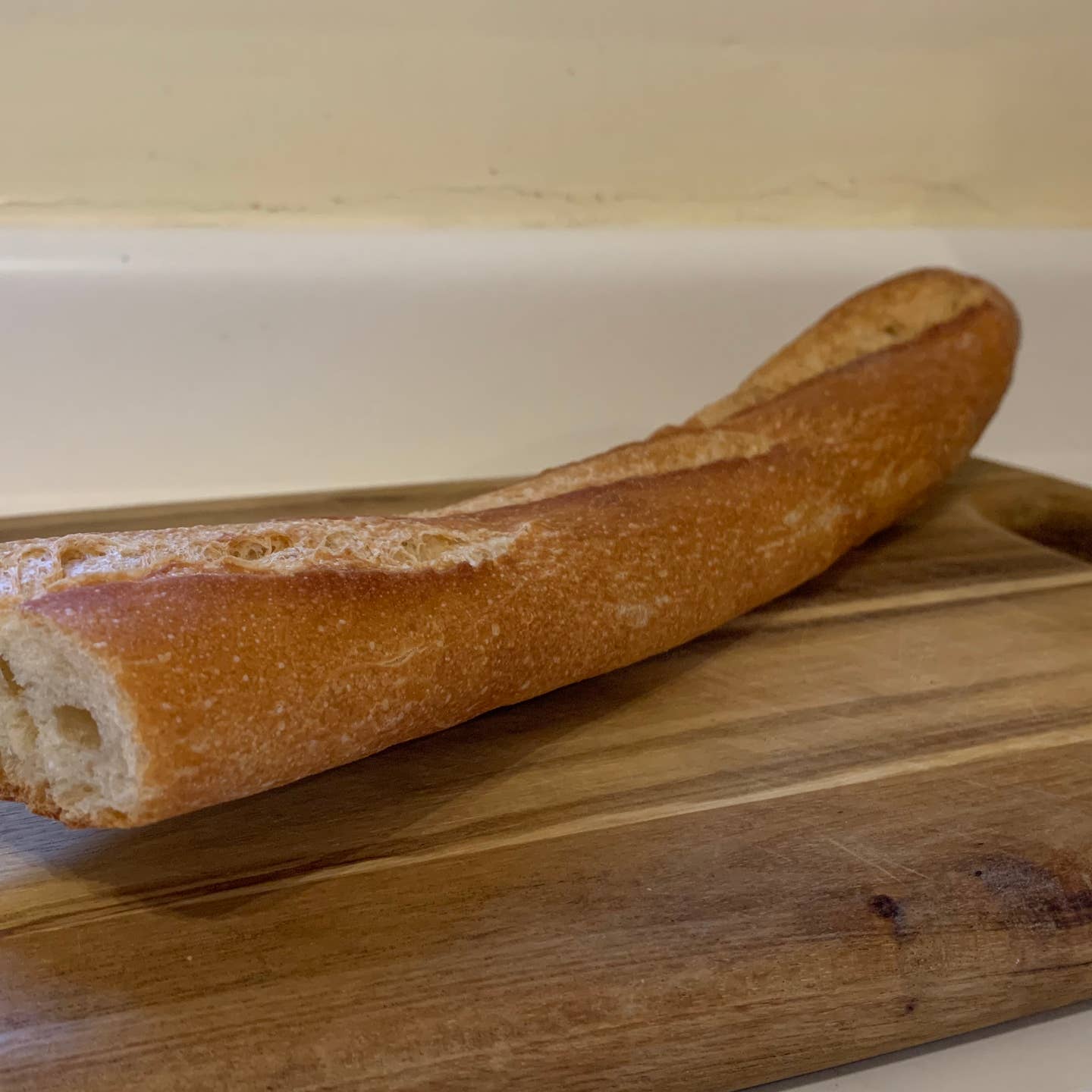 How do I make a dry baguette moist?