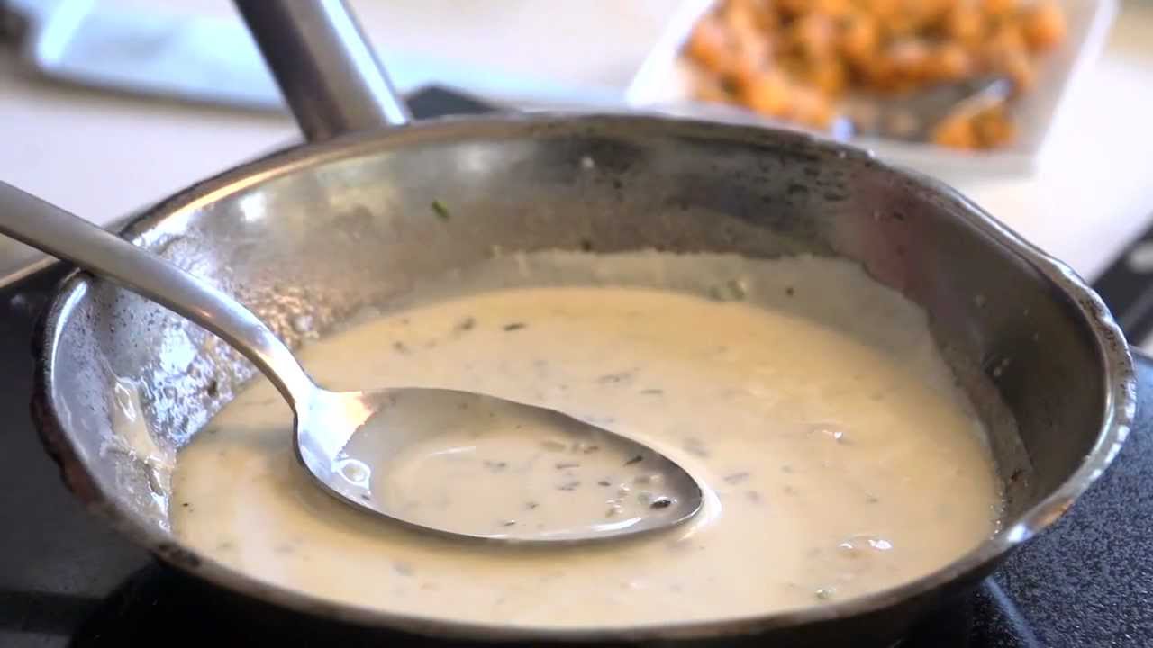 How do you add cream to sauce without splitting it?