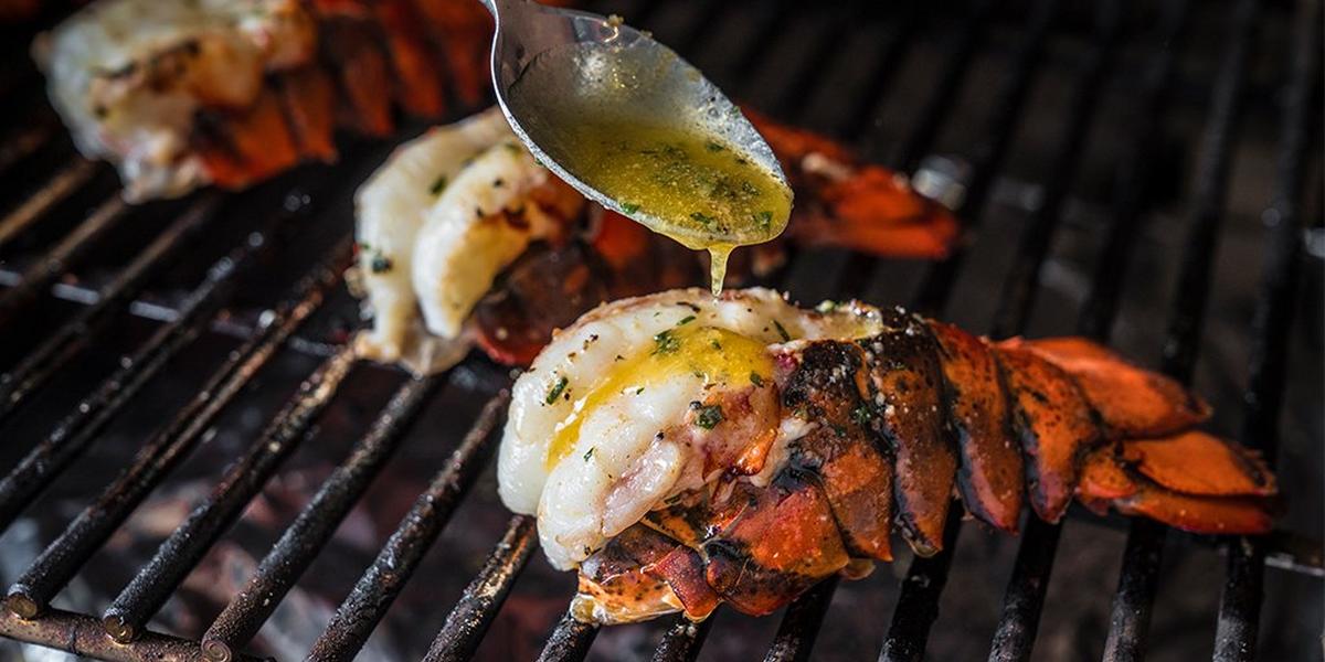 How do you cook a whole lobster on a pellet grill?