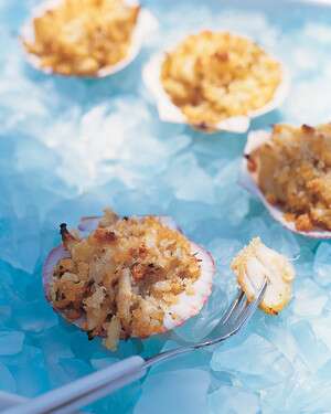 How do you cook pre-made crab cakes in the shell?