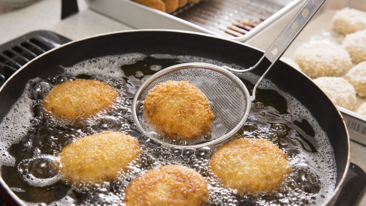 How do you ensure success in deep frying?