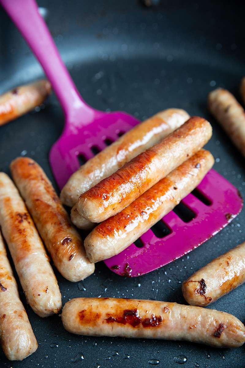 How do you fry large sausage?