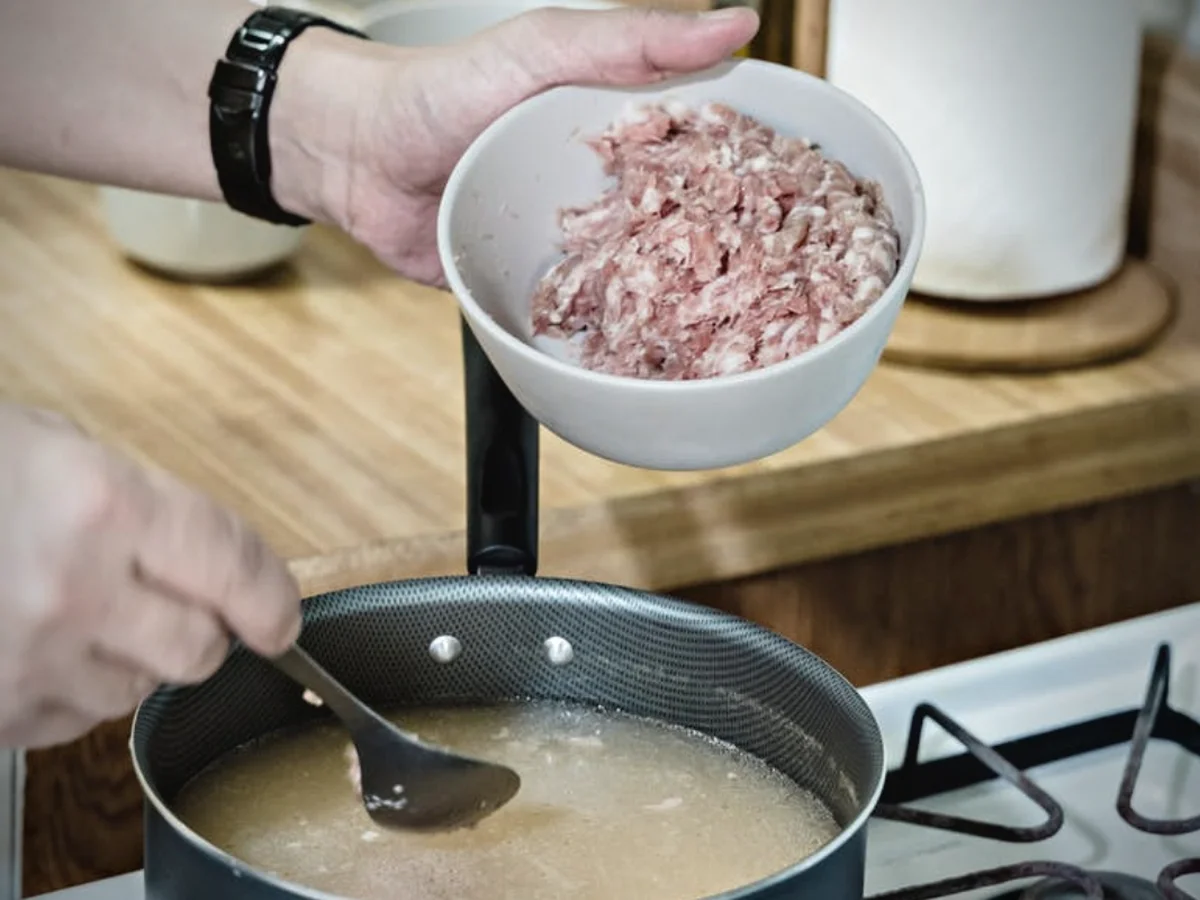 How do you get rid of foam when boiling chicken?