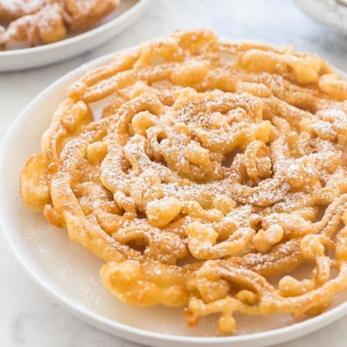 How do you make funnel cakes crispy?