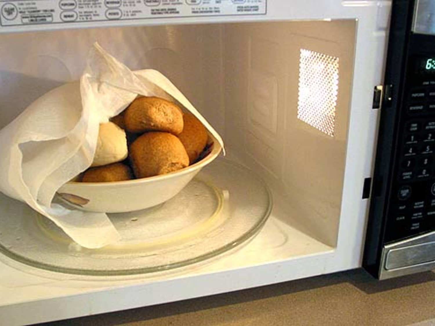 How do you moisten food in the microwave?