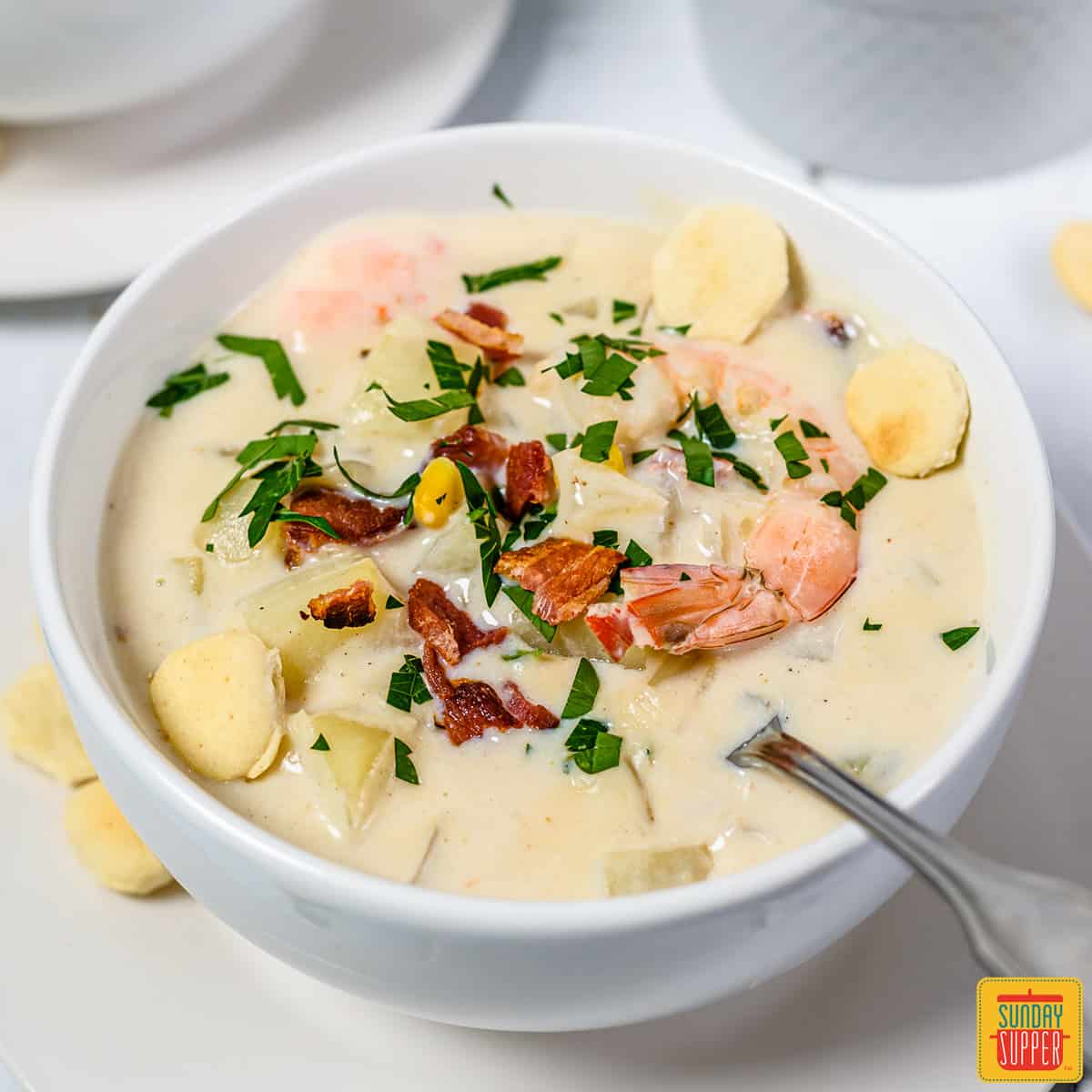 How do you reheat seafood chowder?