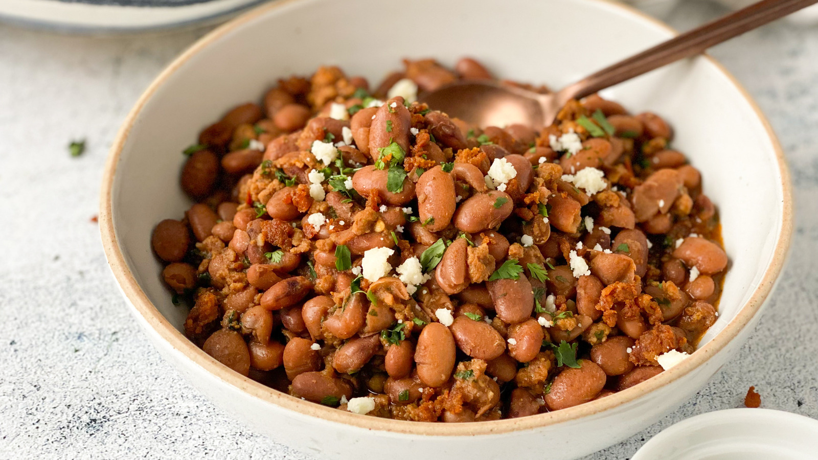 How do you spice up pinto beans?