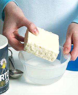 How do you store opened feta cheese?