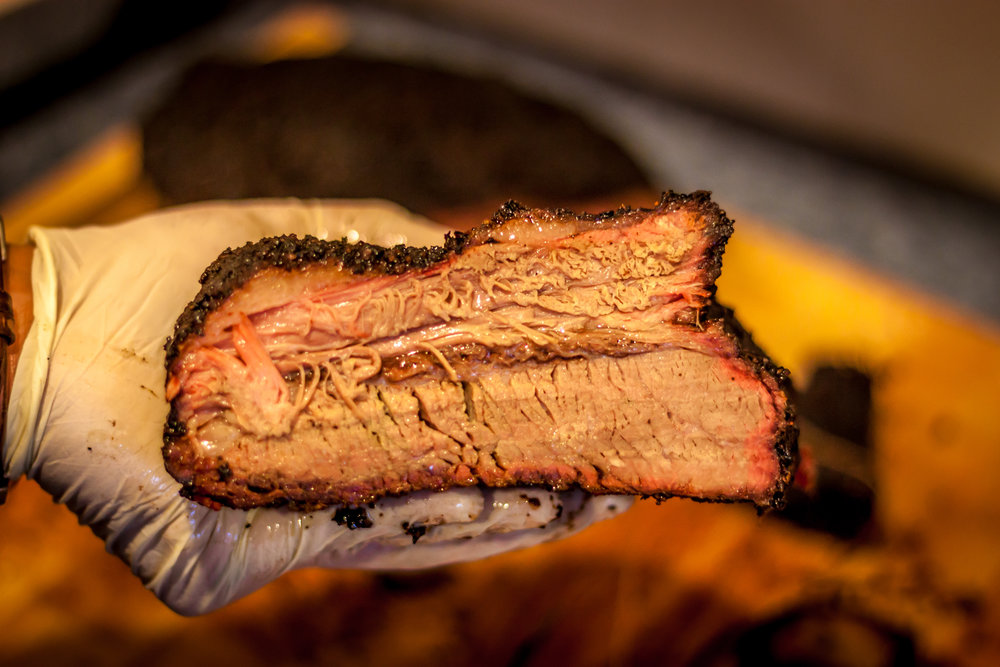 How long does Aaron Franklin hold brisket?