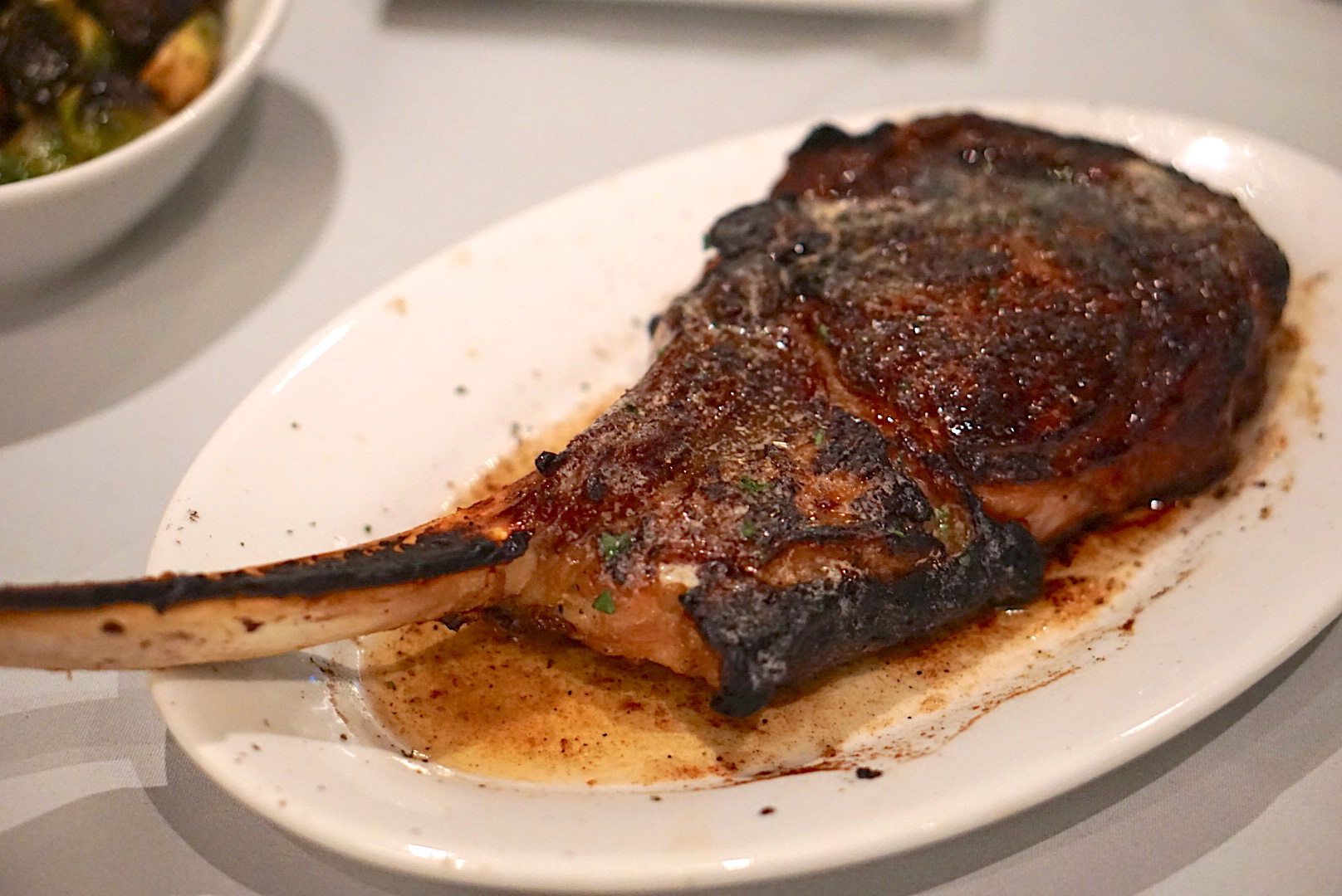 How many ounces is the tomahawk ribeye at Ruth Chris?