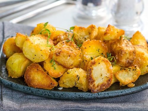 Is it necessary to boil potatoes before roasting?