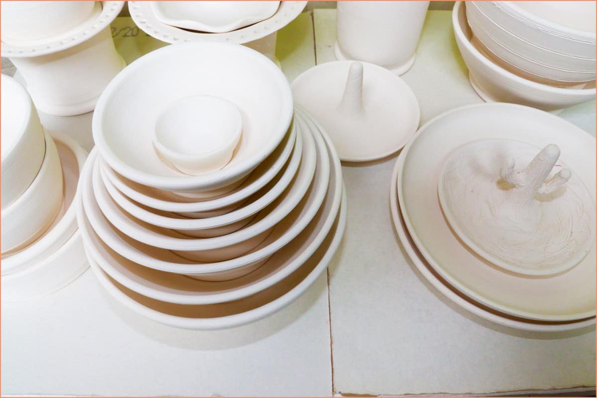 What best defines a bisque firing?