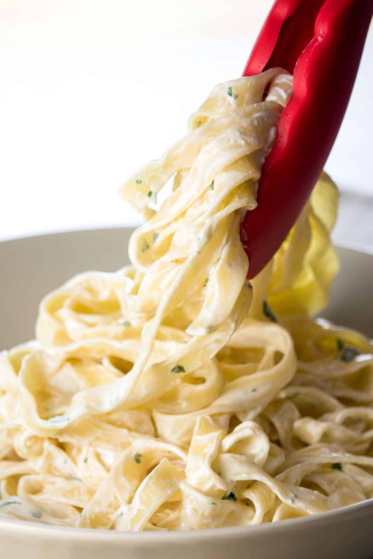 What can I add to bland fettuccine alfredo?