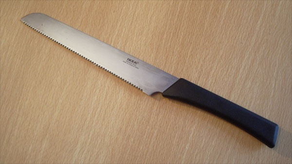 What does a bread knife cut through?