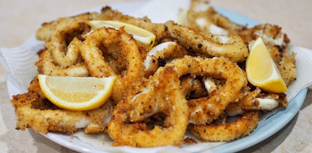 What does soaking calamari in milk do?