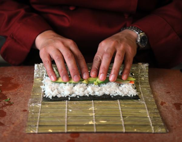 What is a person who makes sushi called?