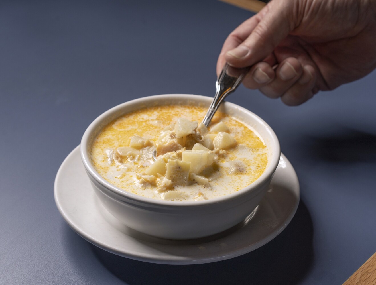 What is clam chowder classified?