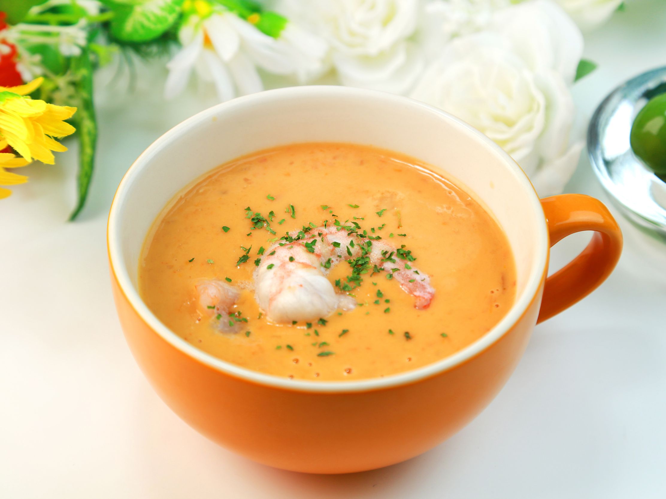 What is the common ingredient needed for a cream soup to be considered a bisque?