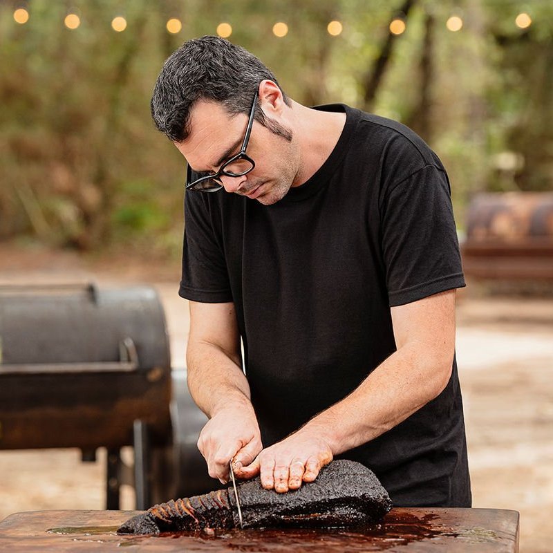 What temp does Aaron Franklin hold his brisket?