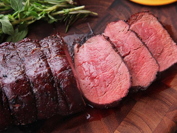 What temperature do you cook beef tenderloin in the oven?