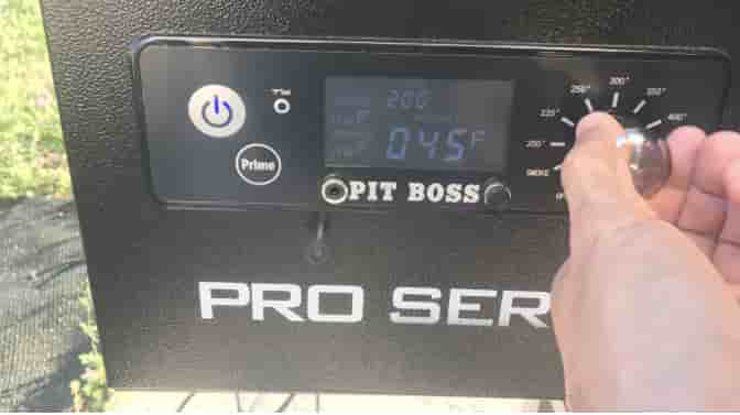 What temperature is the smoke setting on pit boss vertical smoker?