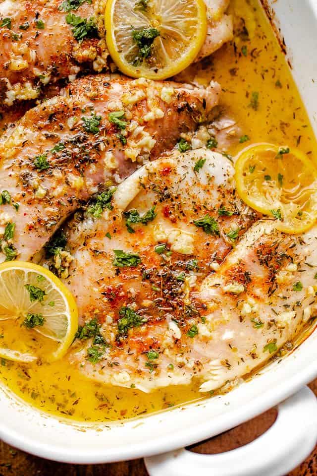 What temperature should tilapia be cooked to?