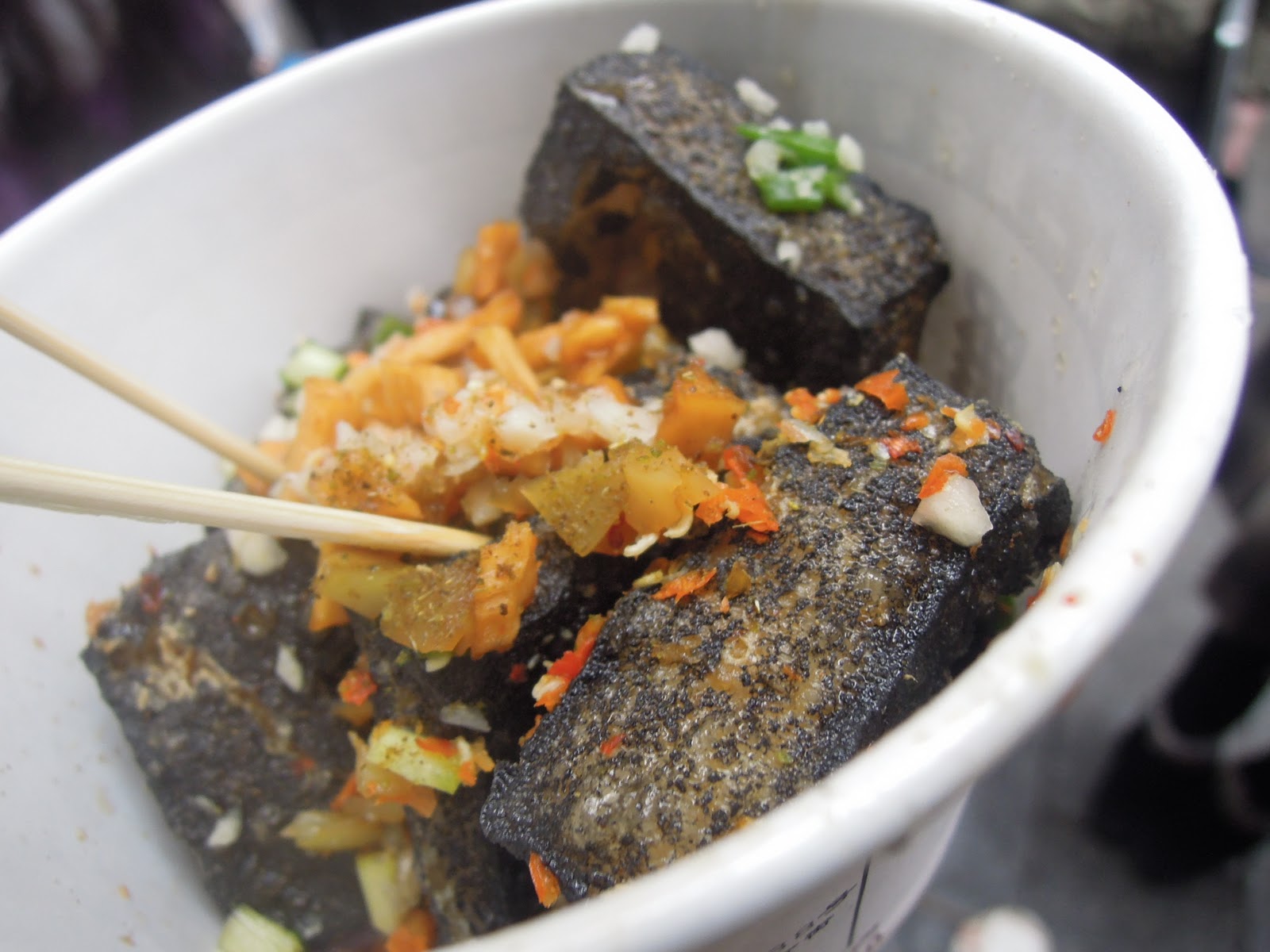 Where can I eat stinky tofu in China?