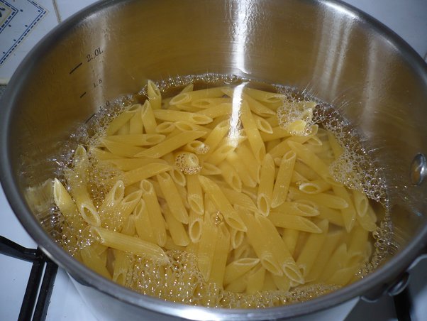Why does pasta swell and soften when boiled?