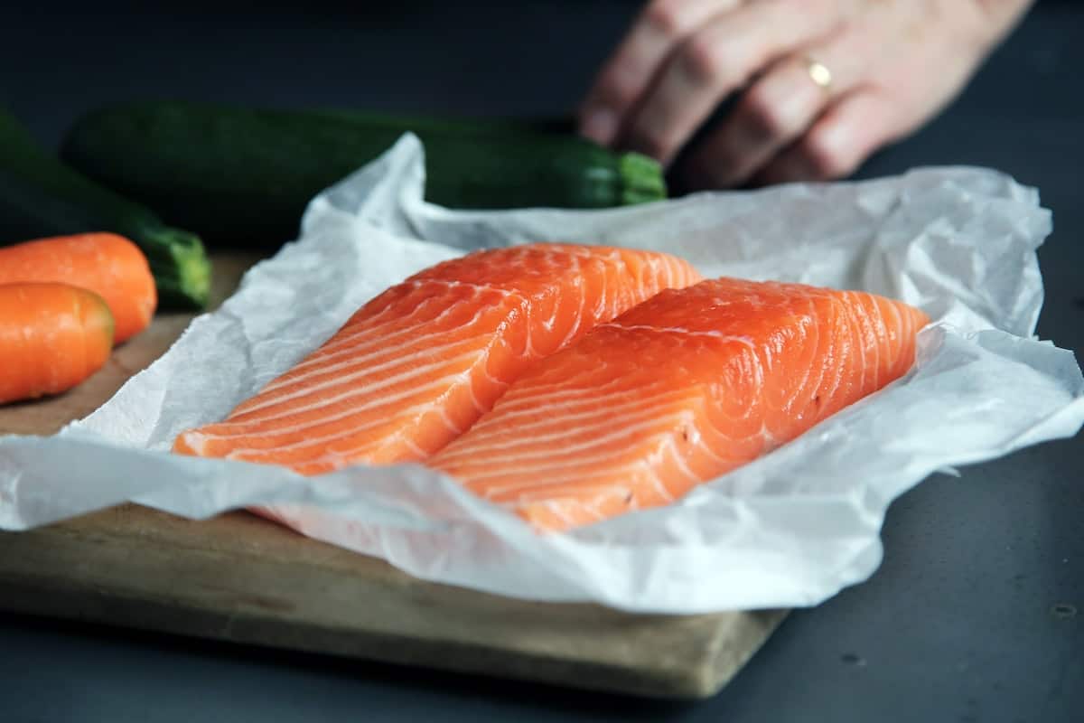 Why does salmon have a weird taste?
